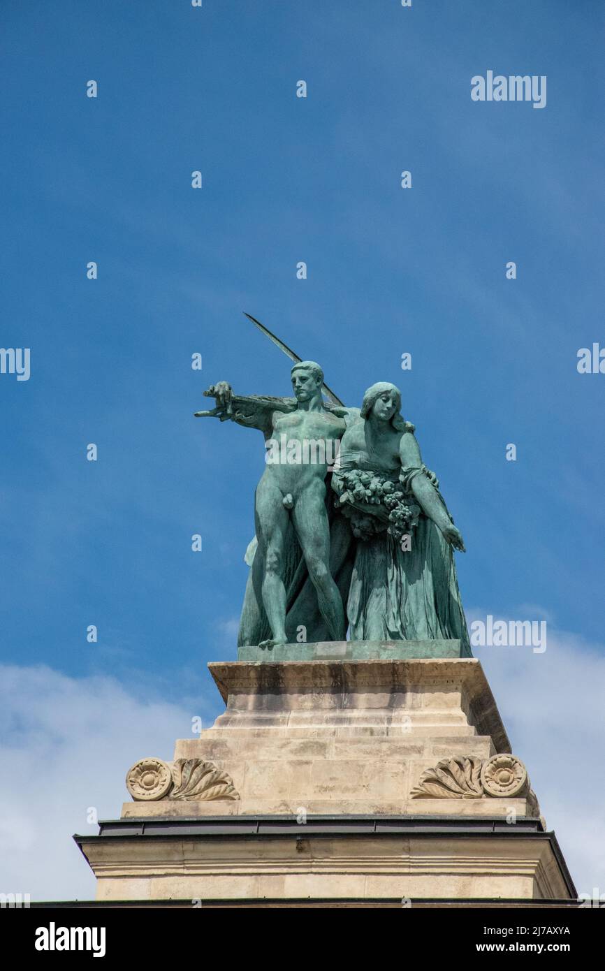 A statue depicting Wealth and Labour in Heroes' Square in Budapest ...