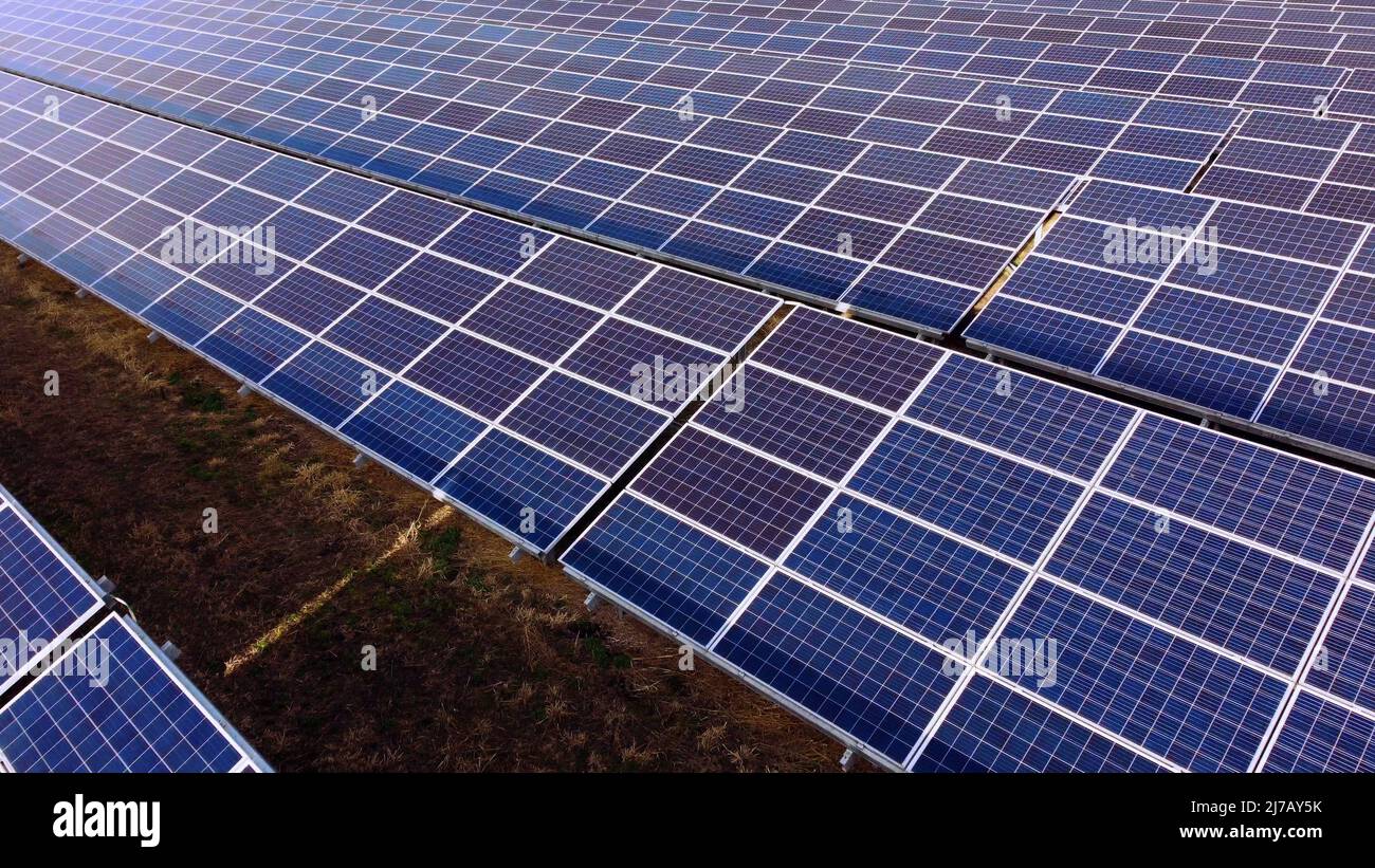 Solar power stations. Blue solar power plant modules close up Stock ...