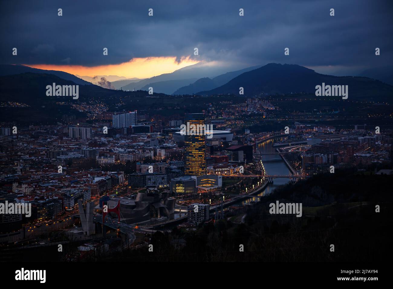 Dusk, twilight over Bilbao city in Basque Country, Spain. Town between ...