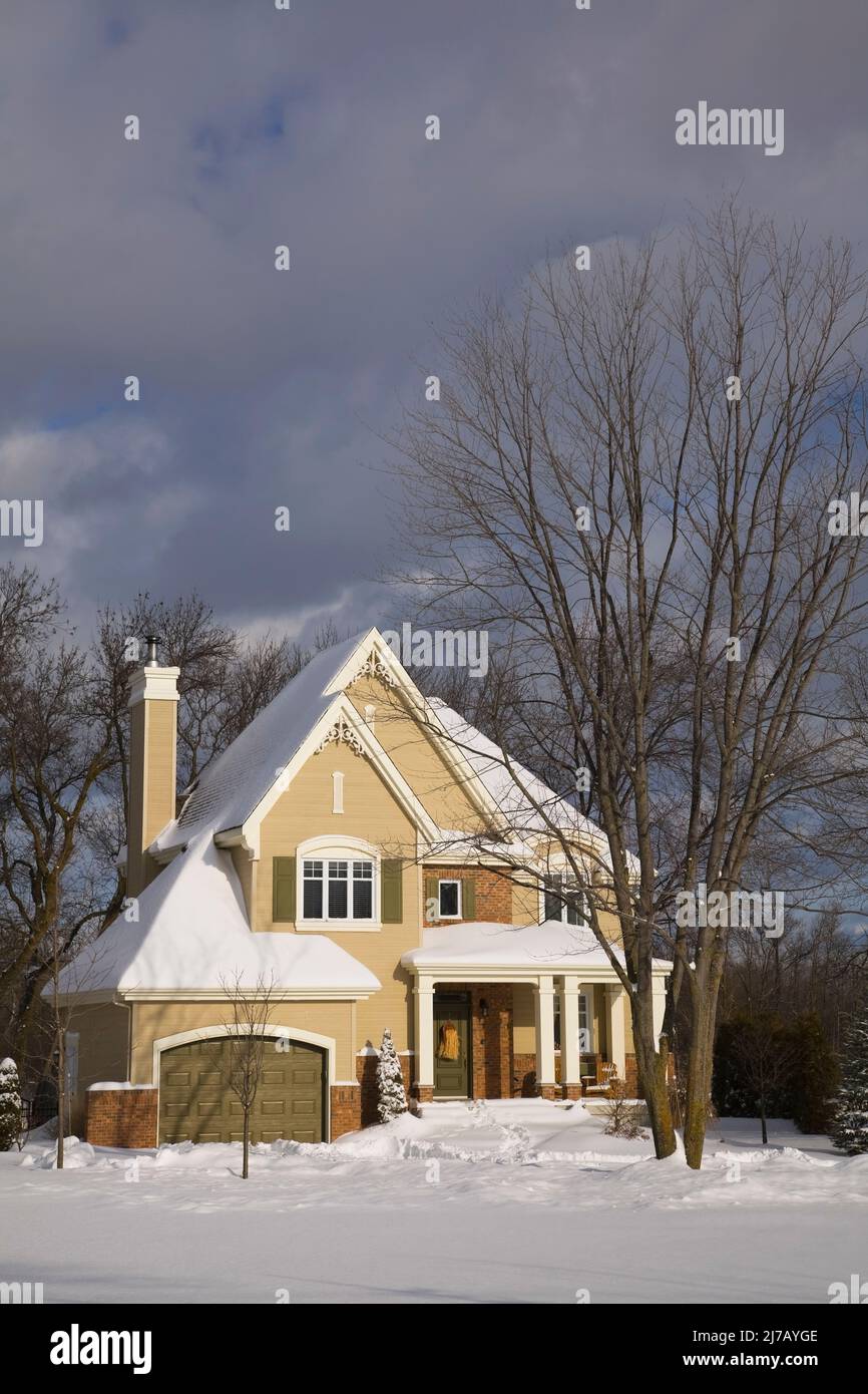 Modern red nuanced brick and beige wood plank cladded two story cottage ...
