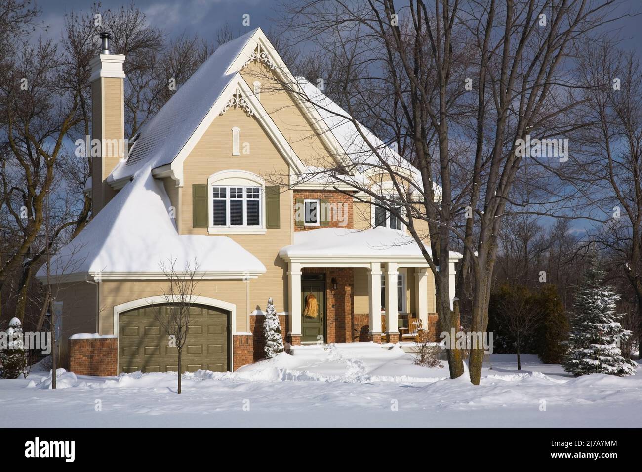 Modern red nuanced brick and beige wood plank cladded two story cottage ...