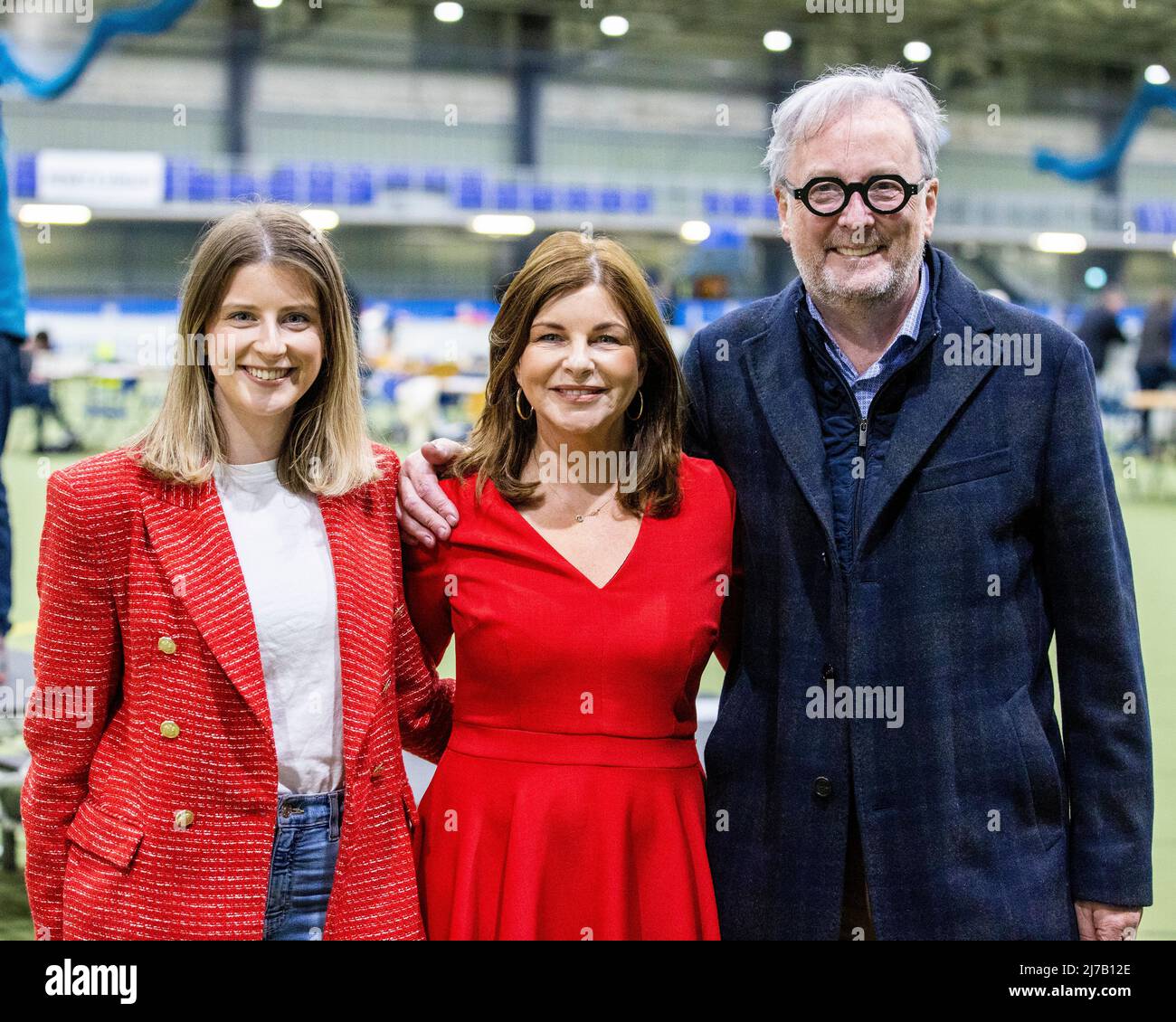 Elected SDLP MLA for Foyle, Sinead McLaughlin (centre) with her husband ...