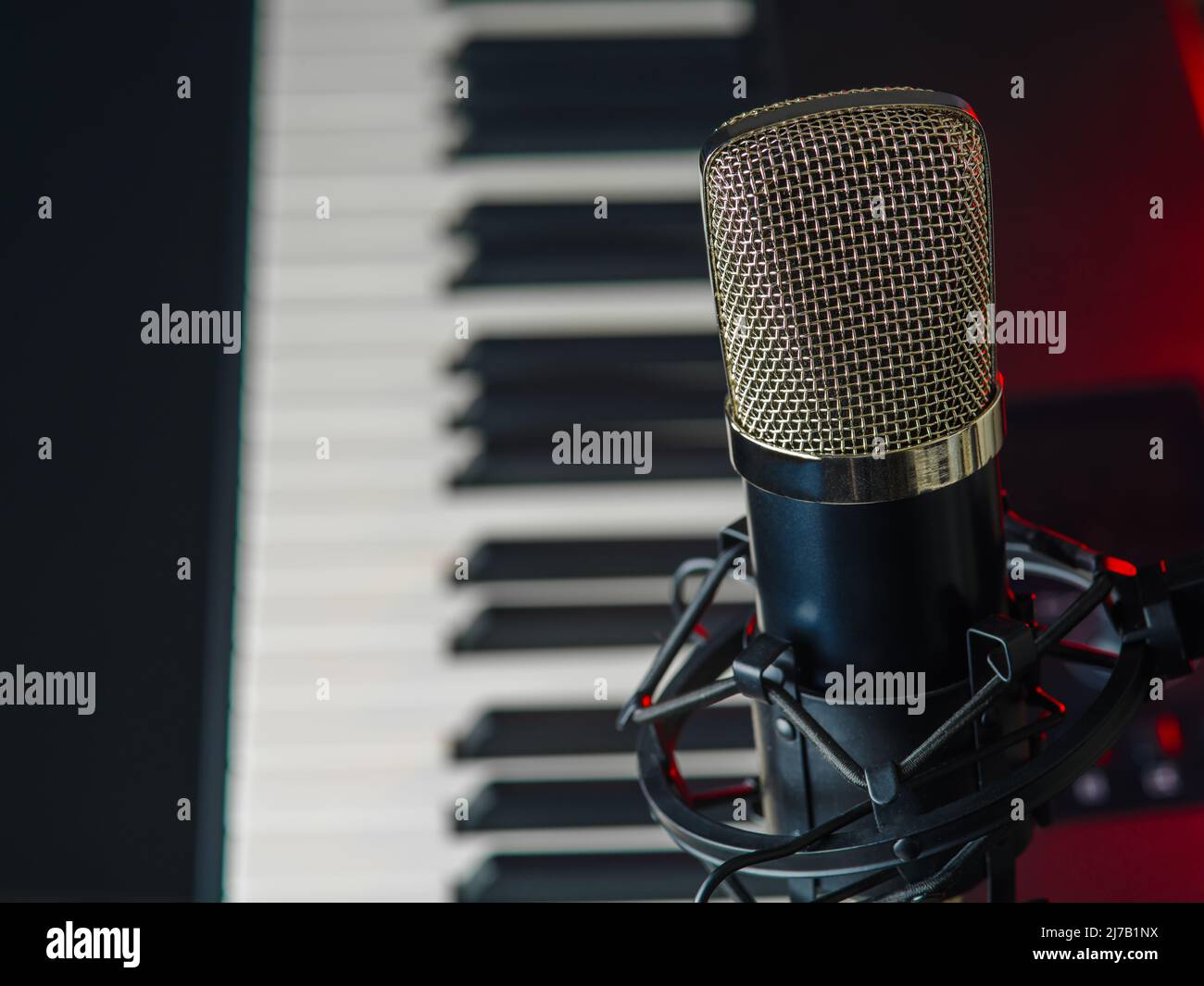 Recording studio. MIDI keyboard, synthesizer and professional ...