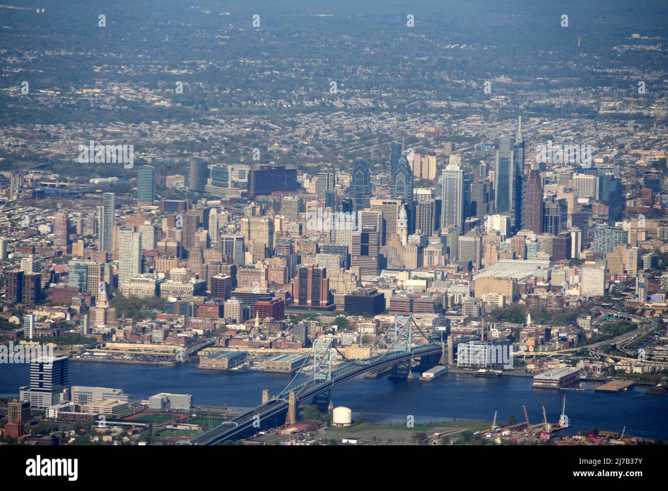 The Benjamin Franklin Bridge over the Delaware River and the downtown ...