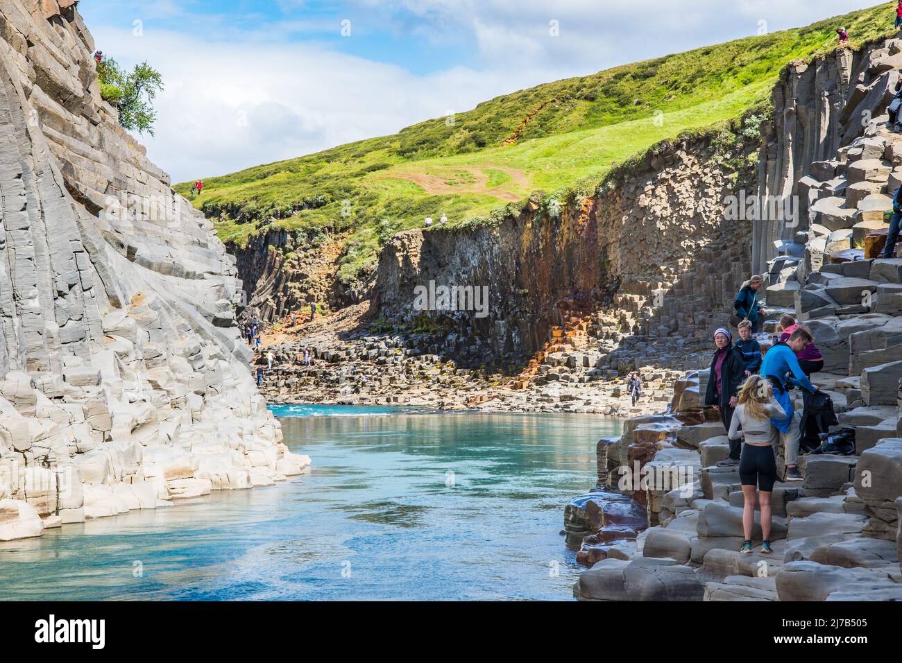 Studlagil Iceland - July 16. 2021: Tourists enjoying the stunning view ...