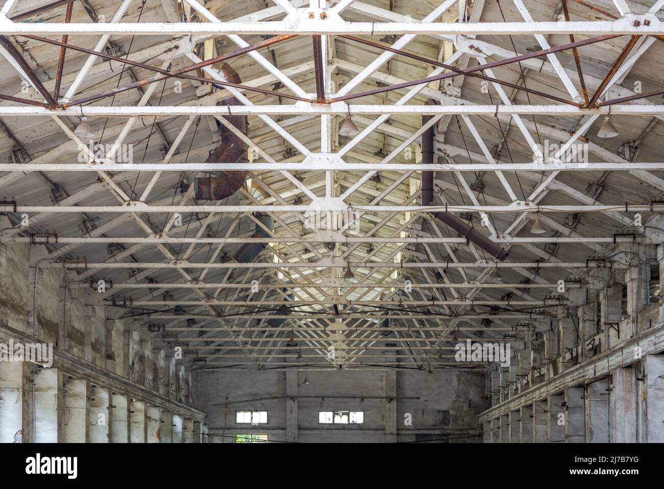An abandoned steel frame structure automobile production workshop Stock ...