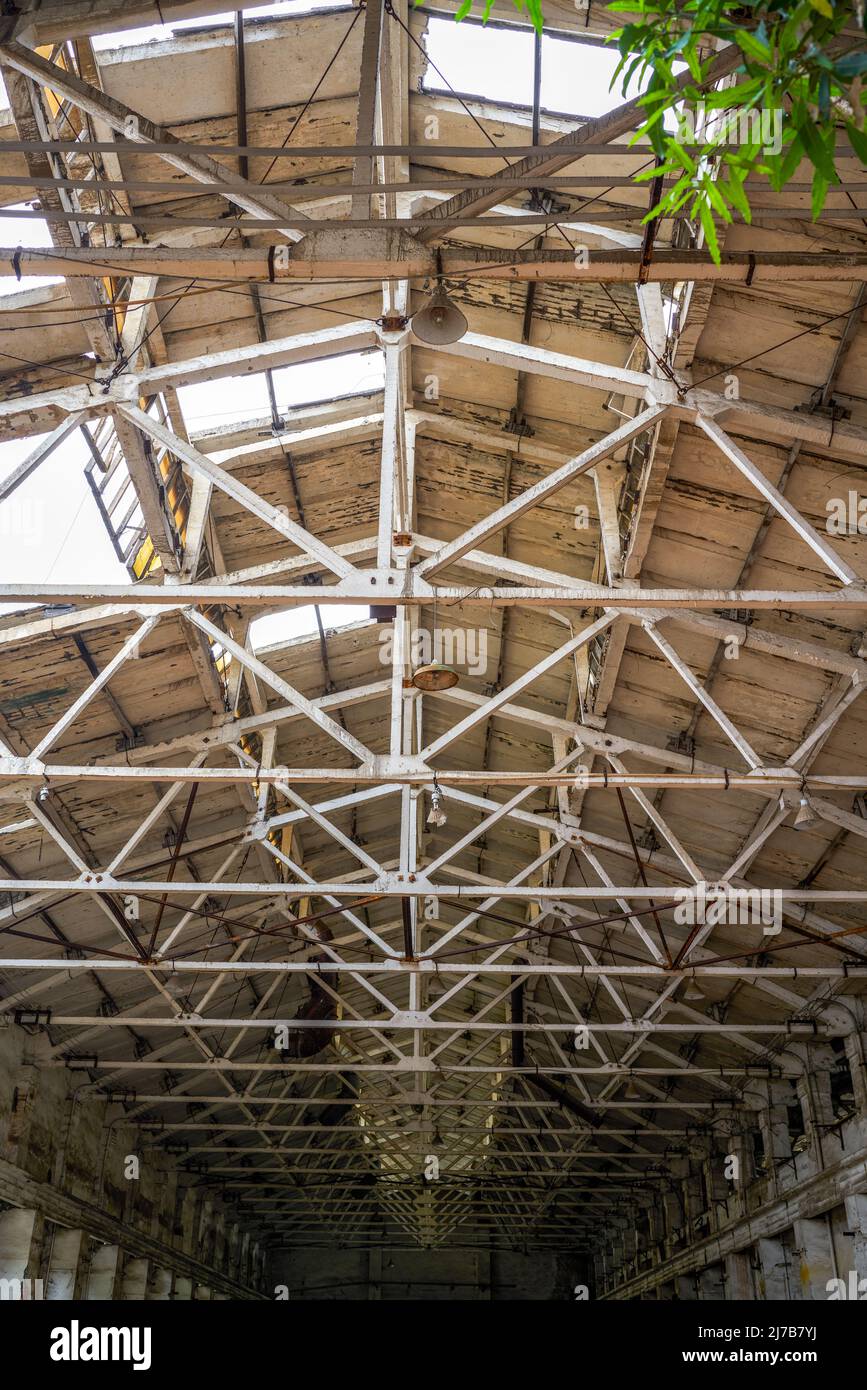 An abandoned steel frame structure automobile production workshop Stock ...