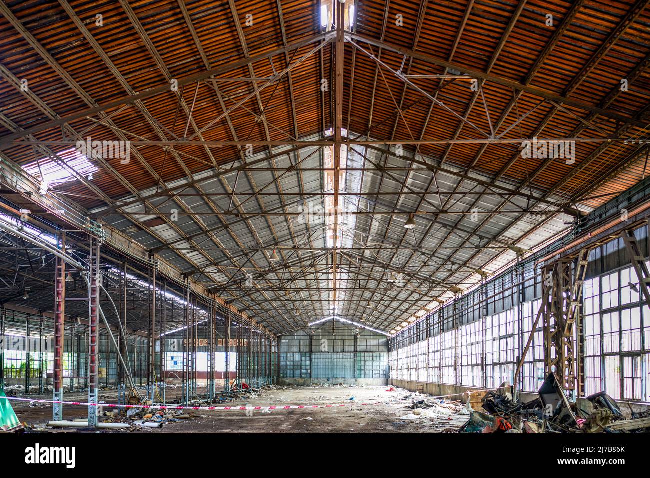 An abandoned steel frame structure automobile production workshop Stock ...