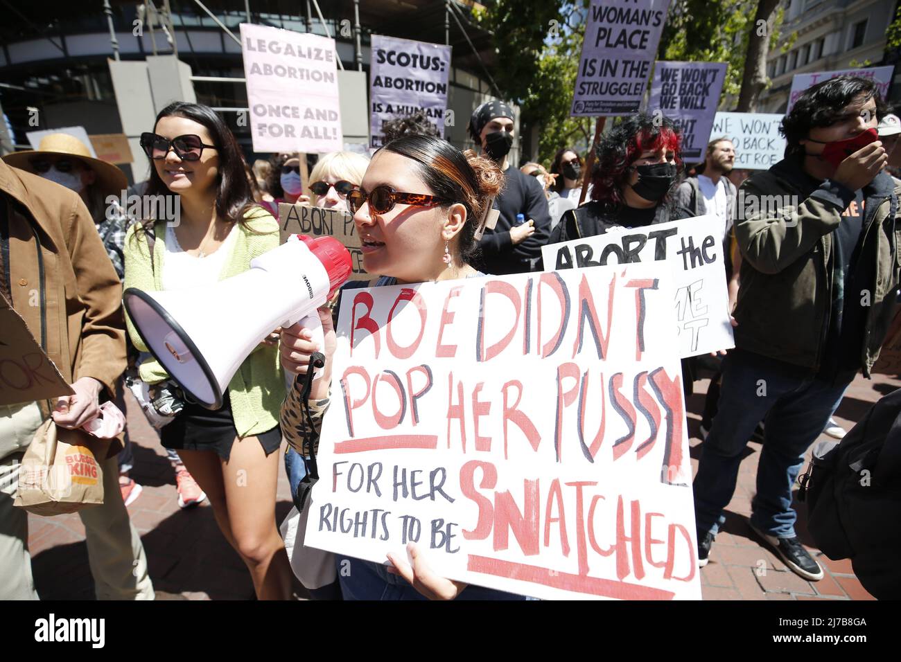 (Editors note image depicts profanity)A protester chants slogans ...