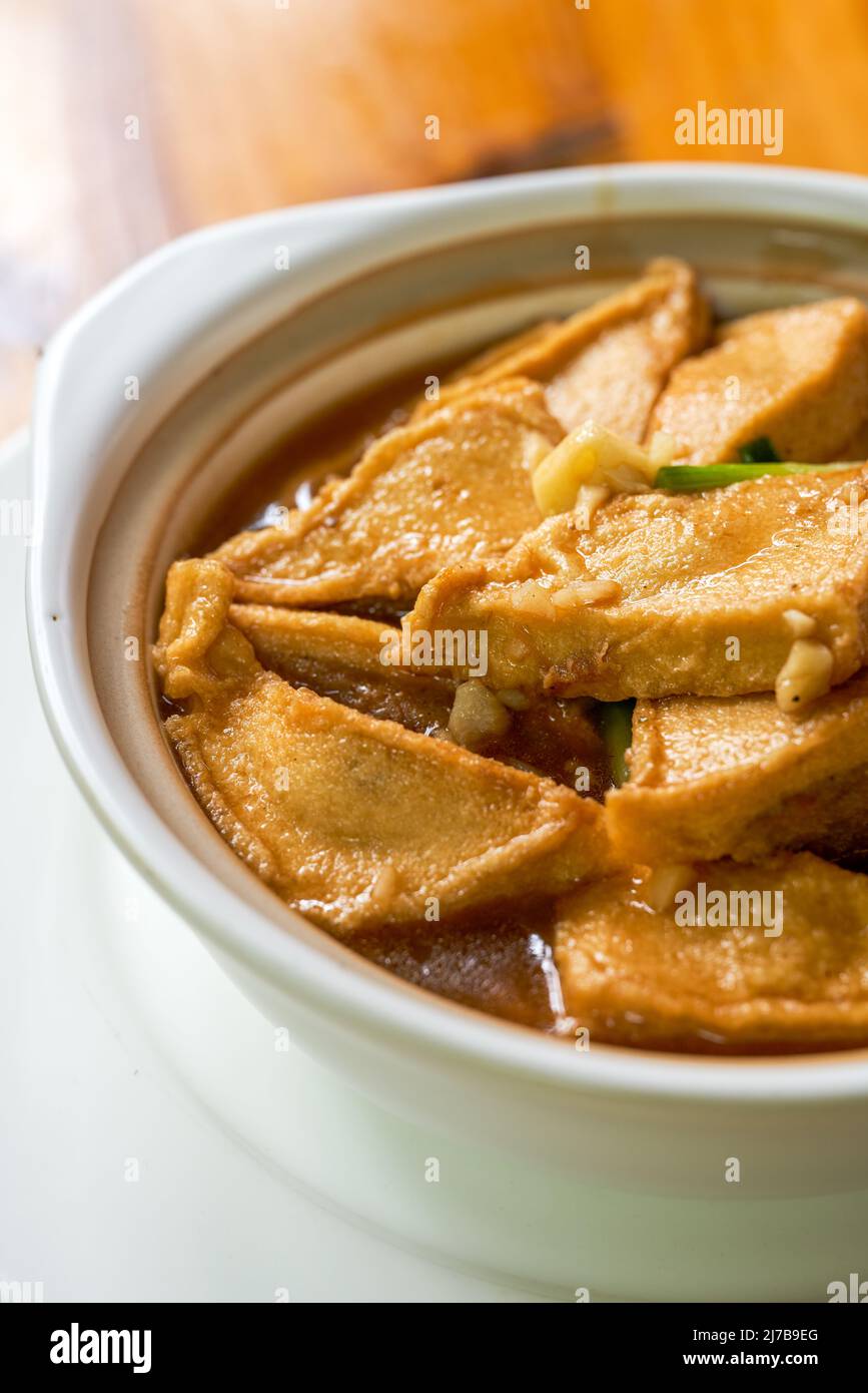 A delicious Chinese dish, braised tofu and stuffed meat in claypot ...