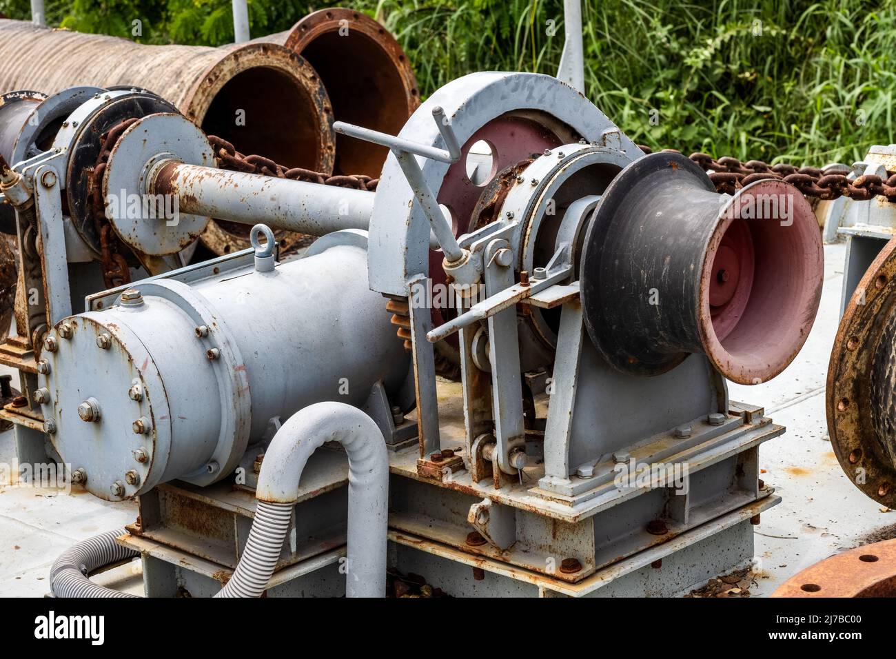 Old rustic abandoned ship anchor machine close up shot Stock Photo - Alamy