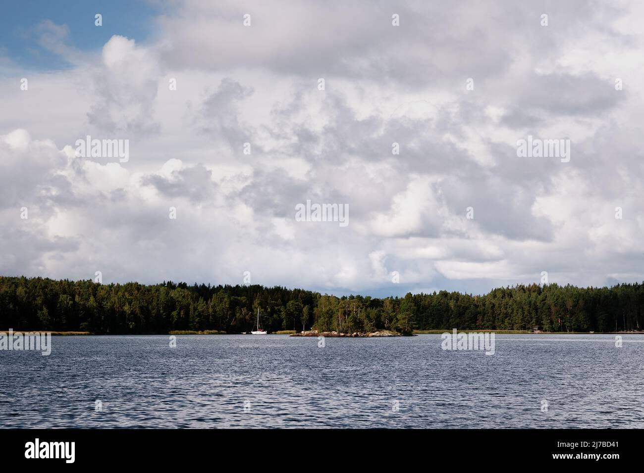 View from the sea in Turku Archipelago, Finland with small island and ...