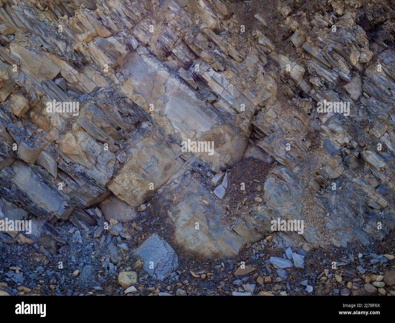 Texture of layers and cracks in sedimentary rock Stock Photo - Alamy