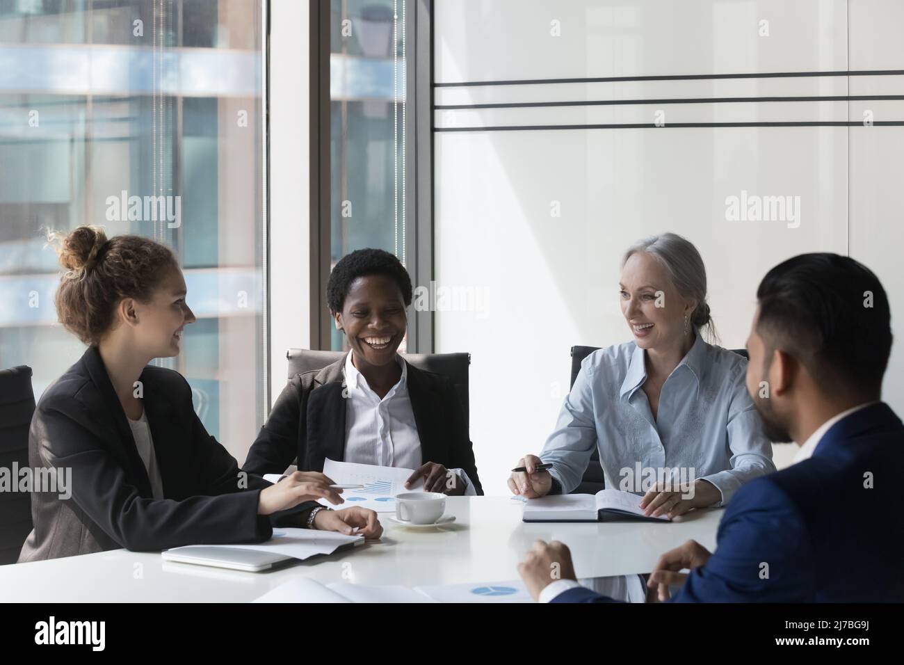 Positive diverse business team of different aged employees Stock Photo ...