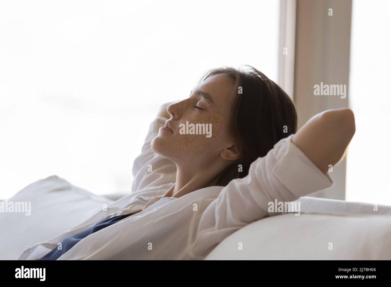 Calm tranquil pretty millennial girl taking break, pause Stock Photo ...