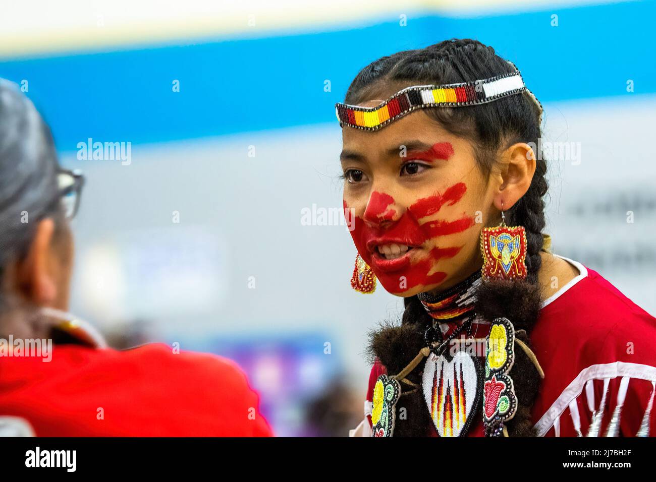 A dancer asks a family member to check her teeth for red marks. The ...