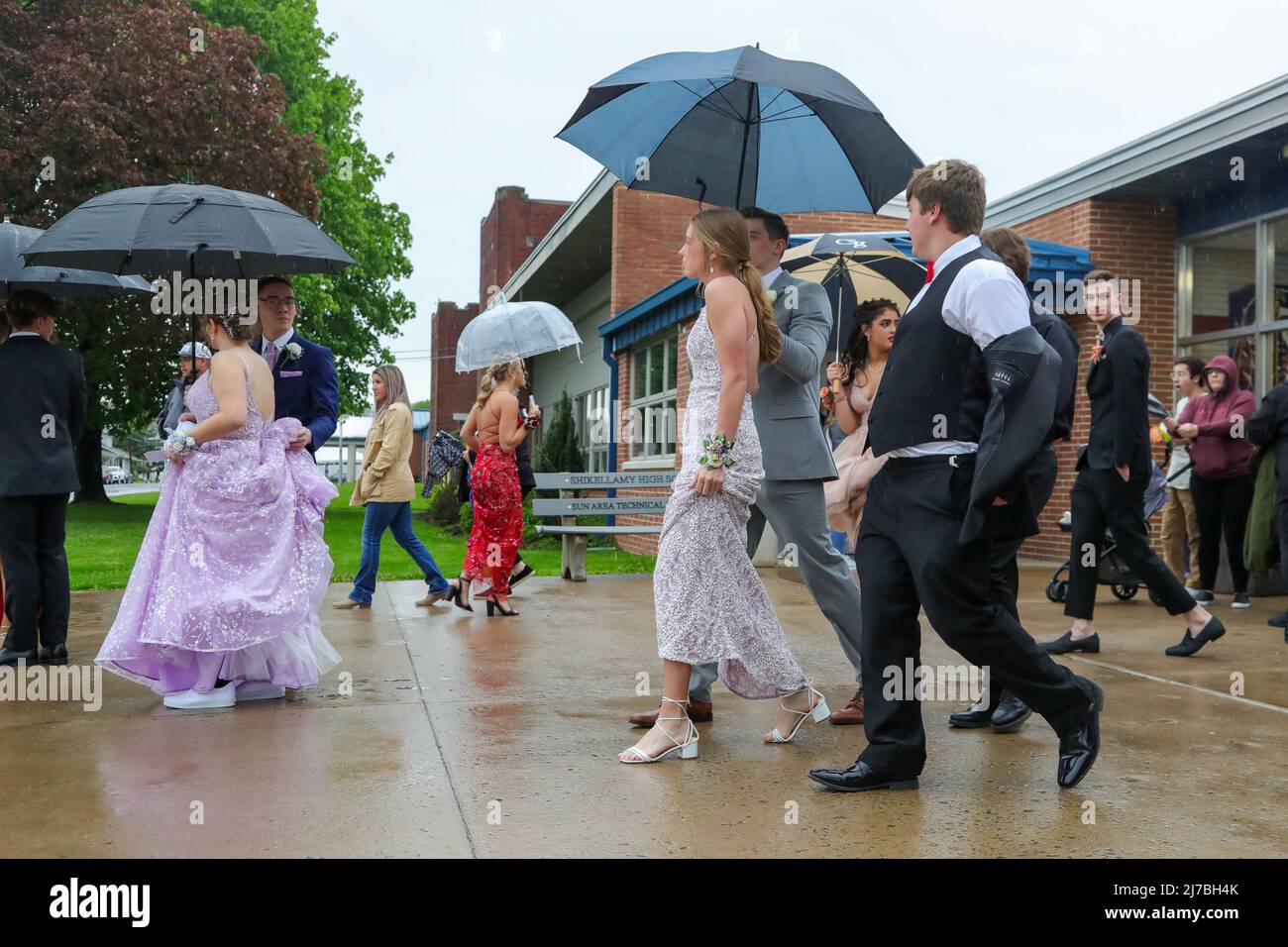 Students in formalwear are seen outside of the Shikellamy High School ...