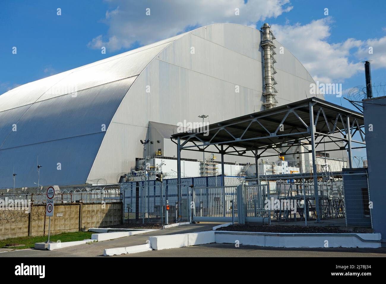 View of the Chernobyl New Safe Confinement and electrical substation ...