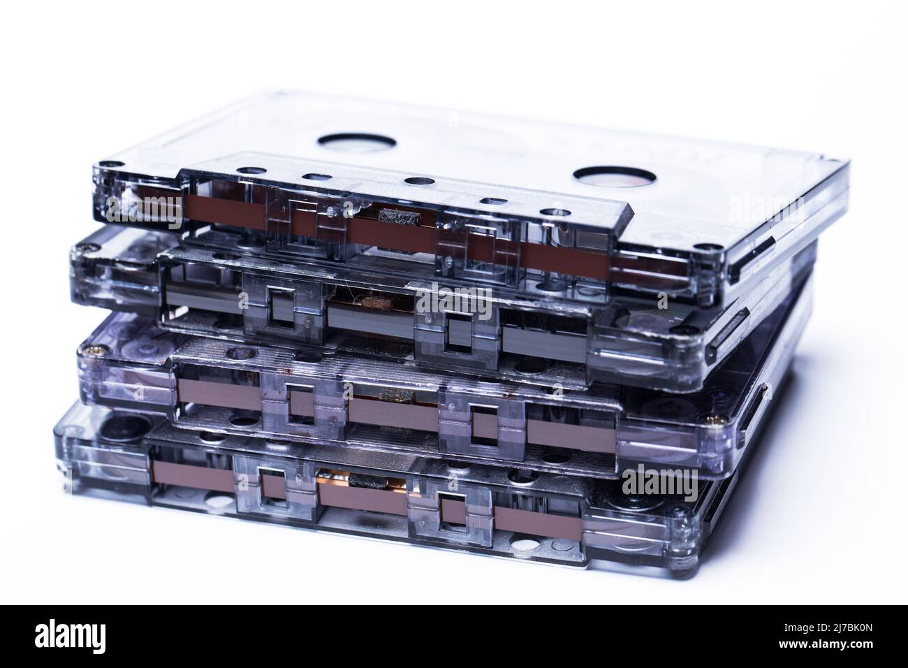 Old-fashion magnetic audio tape over white bacground Stock Photo - Alamy