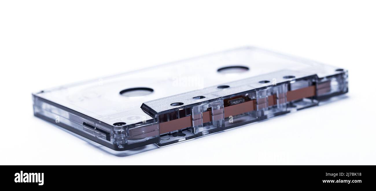 Old-fashion magnetic audio tape over white bacground Stock Photo - Alamy