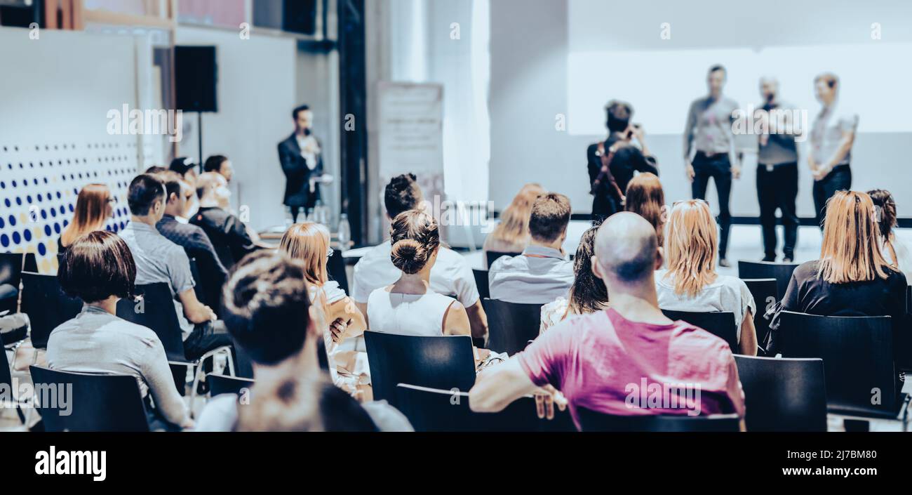 Business speaker giving a talk at business conference event Stock Photo ...