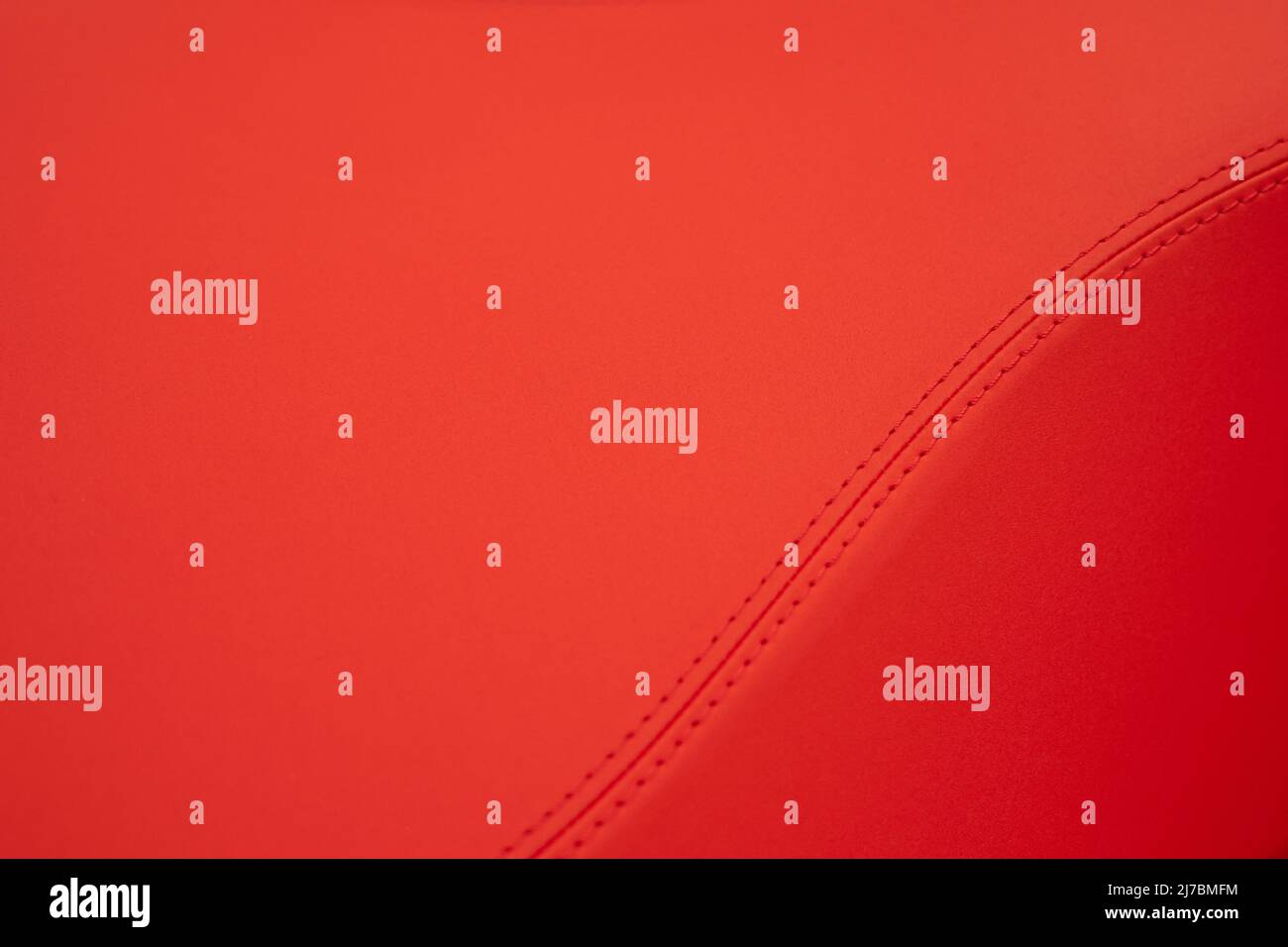 Red leather texture with stitching on an S form Stock Photo - Alamy