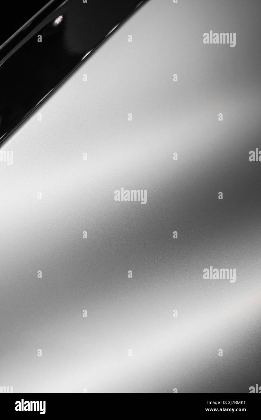 Matte grey metallic texture with bends and black plastic details Stock ...
