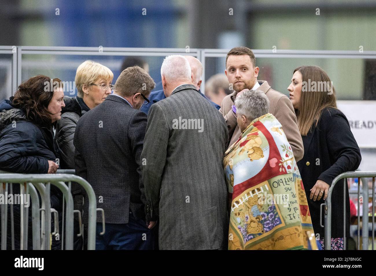 DUP’s Gary Middleton with supporters looks over his shoulder at ...