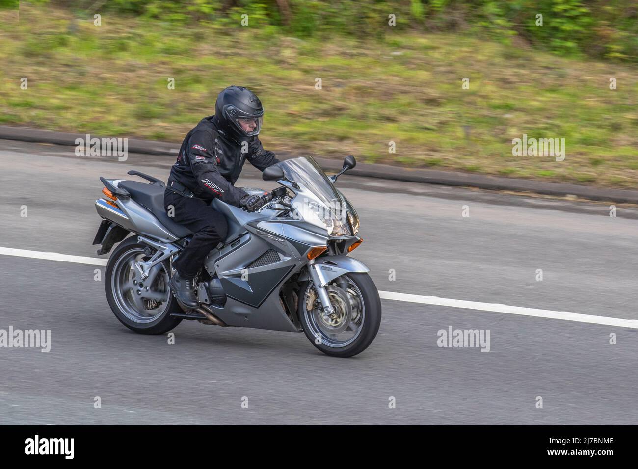Silver metallic vfr800 interceptor motorcycle hi-res stock photography ...
