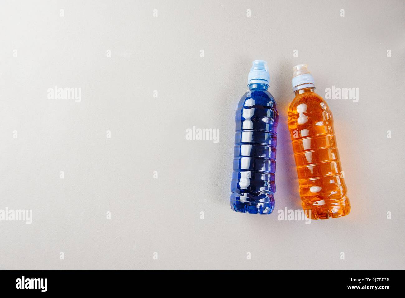 Drink for athletes isotonic on a grey background with copy space Stock ...