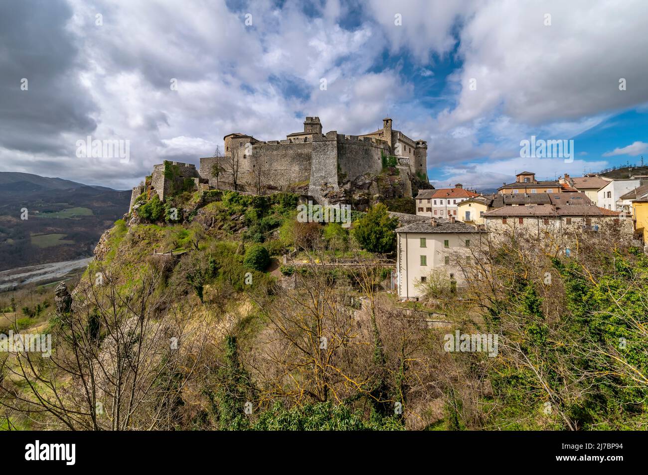 The ancient castle of Bardi, Parma, Italy, under a dramatic sky Stock ...