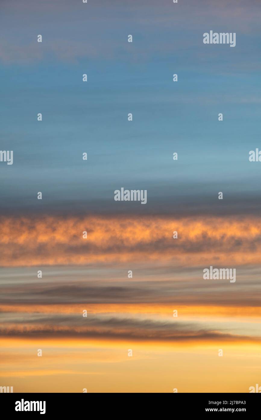 Colourful early morning dawn clouds before sunrise in spring ...