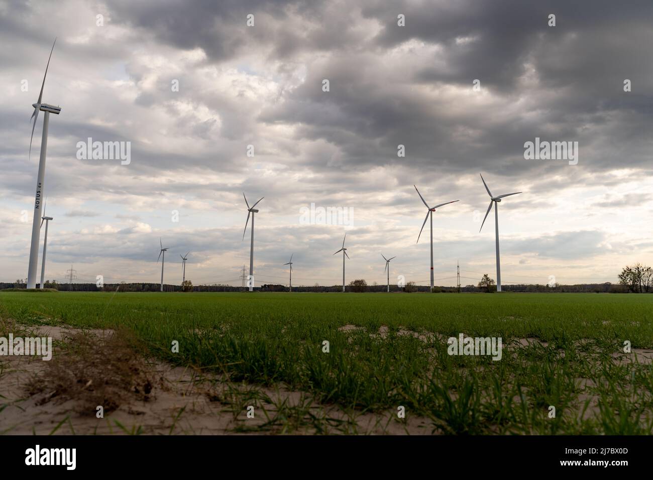 Wind turbines in the landscape. A wind farm to produce energy from ...