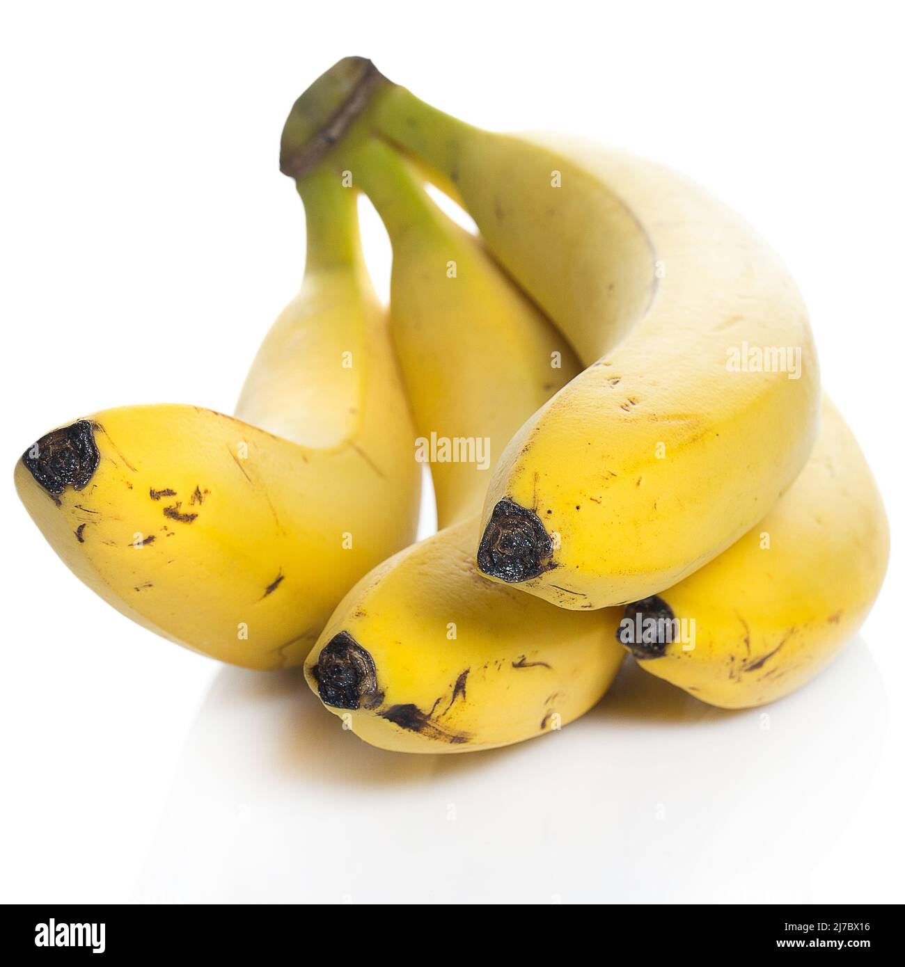 Natural yellow ripe bananas over white background Stock Photo - Alamy