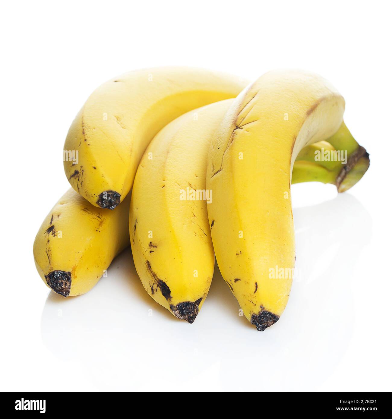 Natural yellow ripe bananas over white background Stock Photo - Alamy