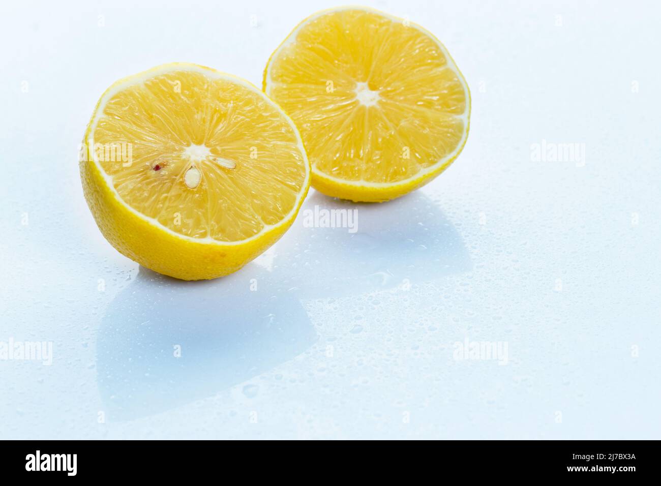 Fresh ripe sliced lemon on white background Stock Photo - Alamy