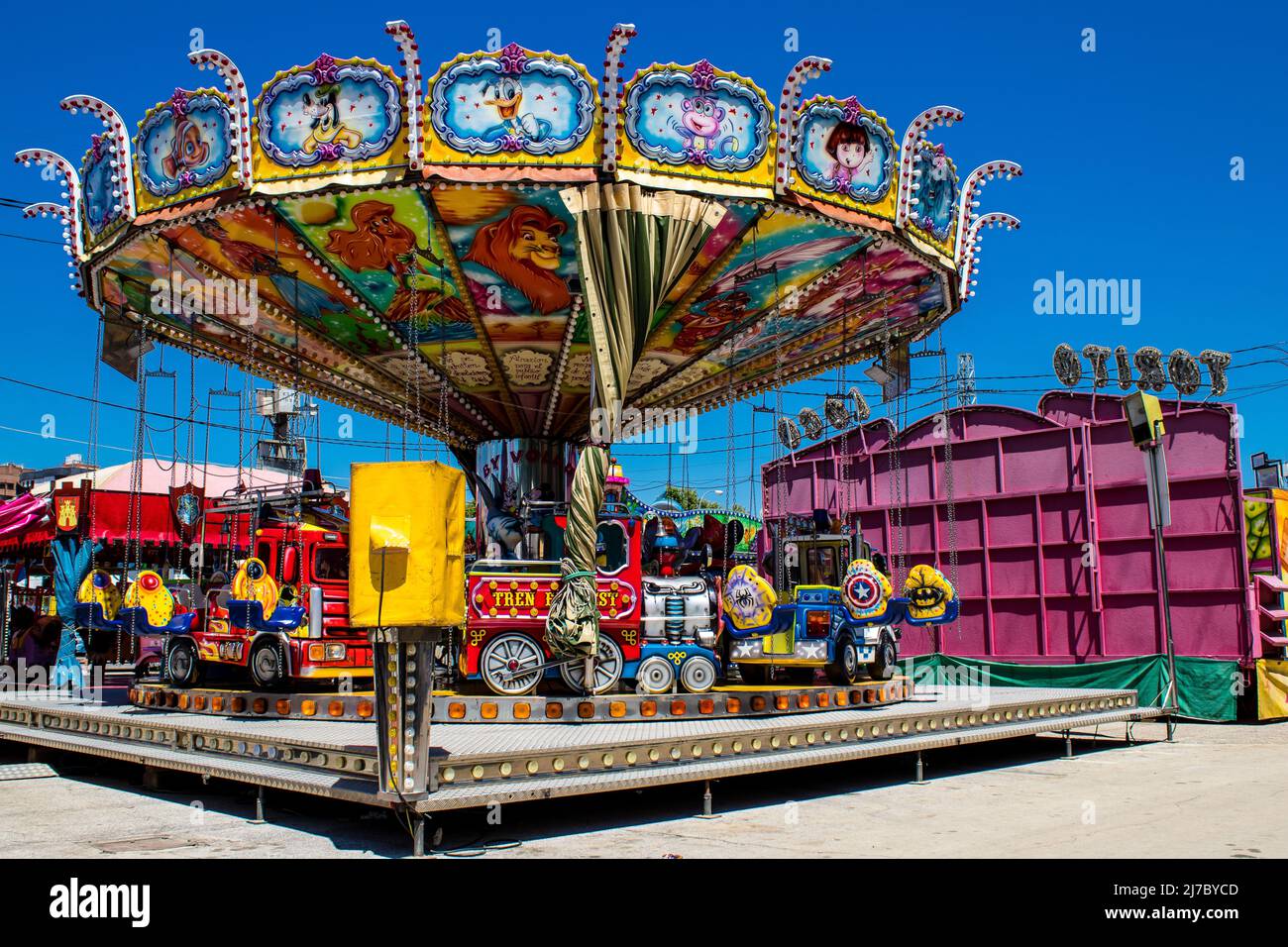 Seville, Spain - May 05, 2022 Feria de Sevilla funfair, the attractions ...