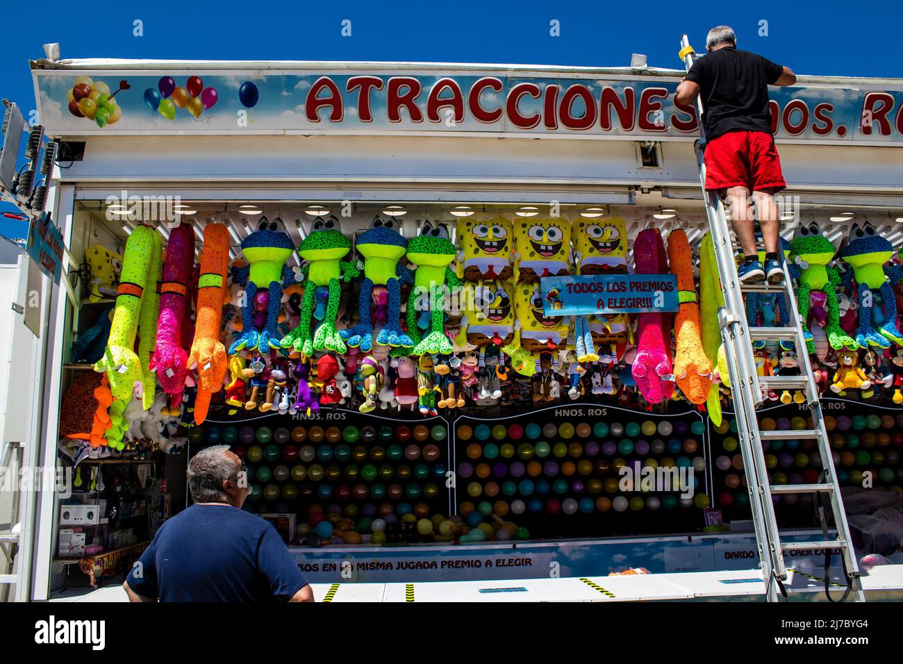 Seville, Spain - May 05, 2022 Feria de Sevilla funfair, the attractions ...