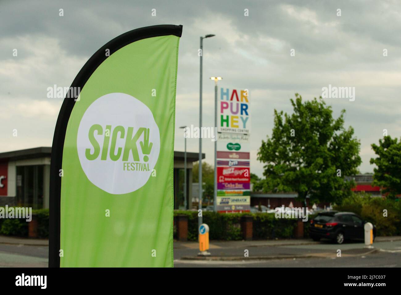 One of the SICK! Festival flags with the Harpurhey sign in the ...