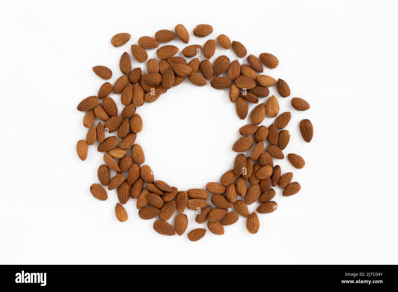 circle frame of peeled almond nuts with copy space for text isolated on ...