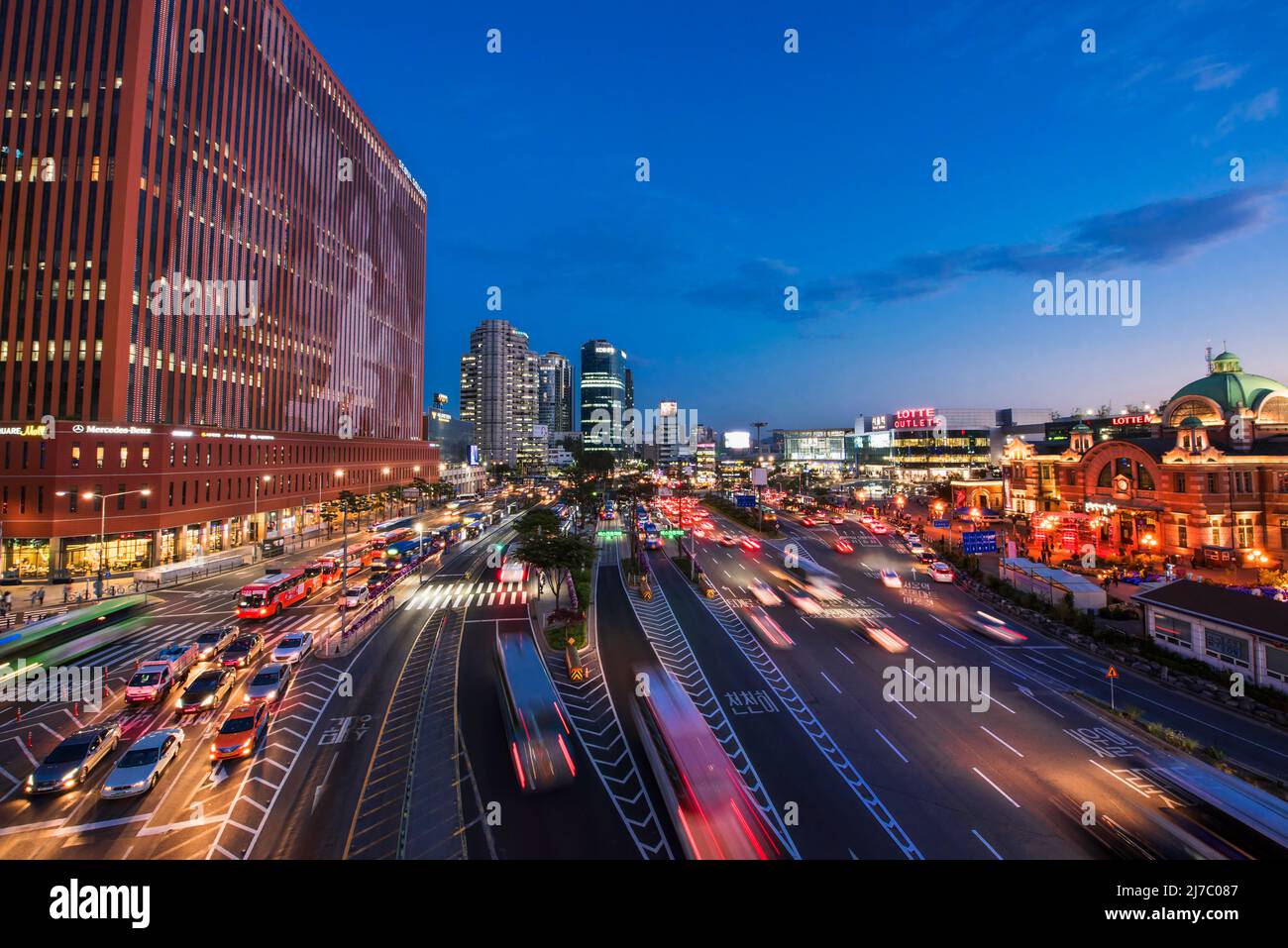 The beautiful and colorful night view of traffic hub and car light ...