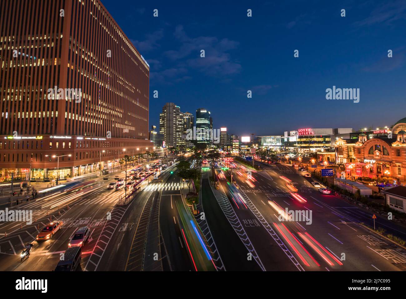 The beautiful and colorful night view of traffic hub and car light ...