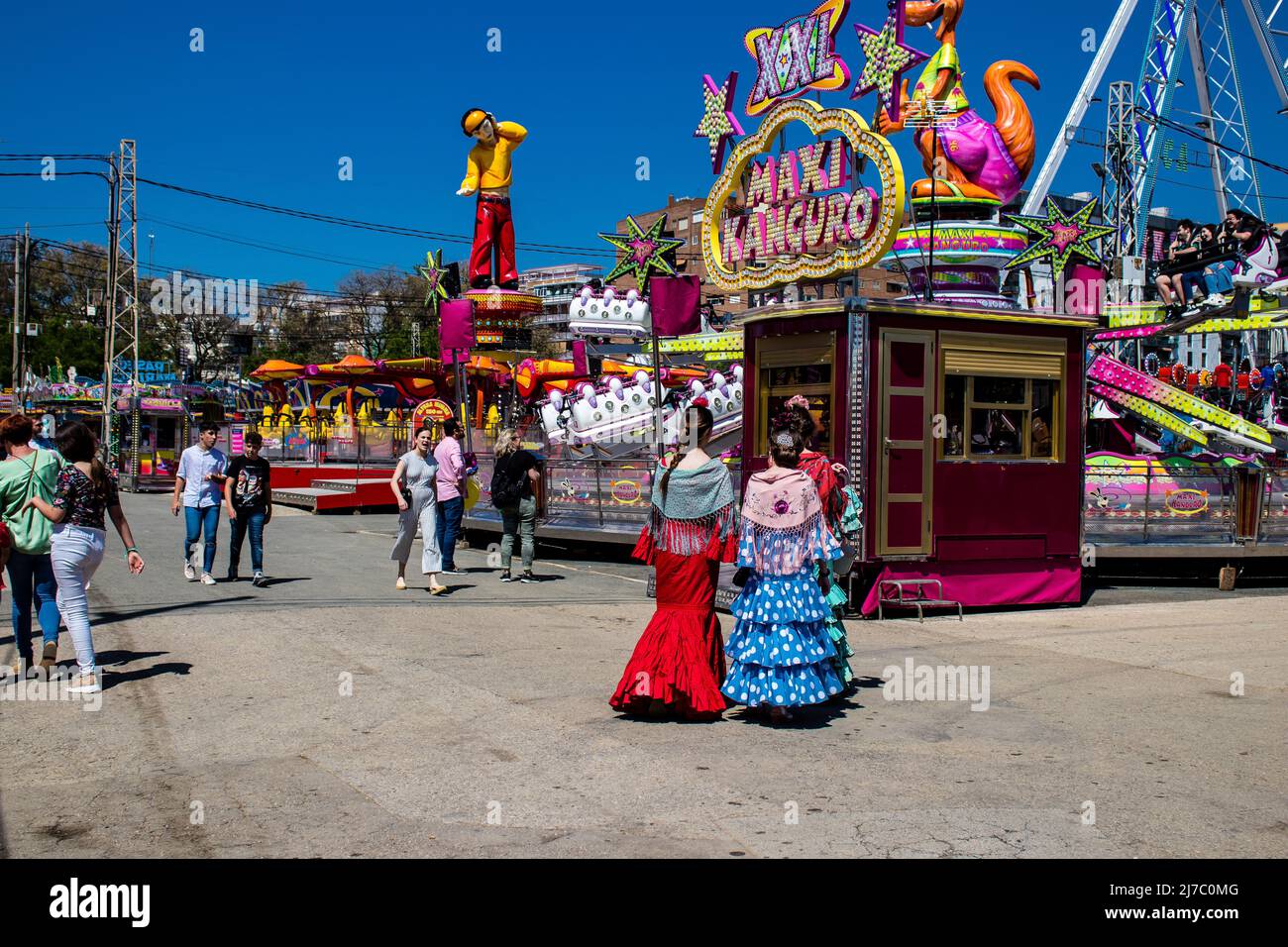 Seville, Spain - May 05, 2022 Feria de Sevilla funfair, the attractions ...