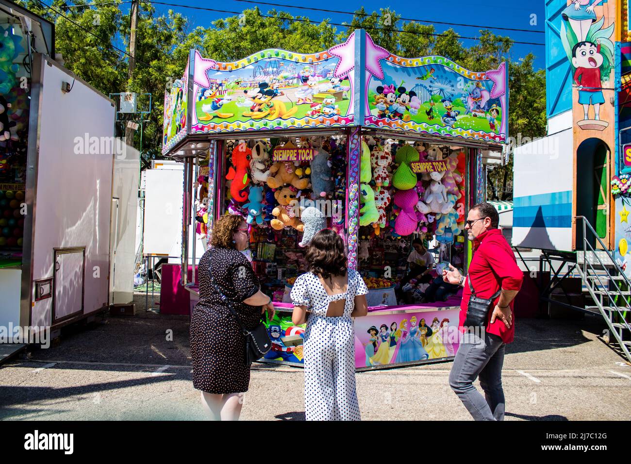 Seville, Spain - May 05, 2022 Feria de Sevilla funfair, the attractions ...
