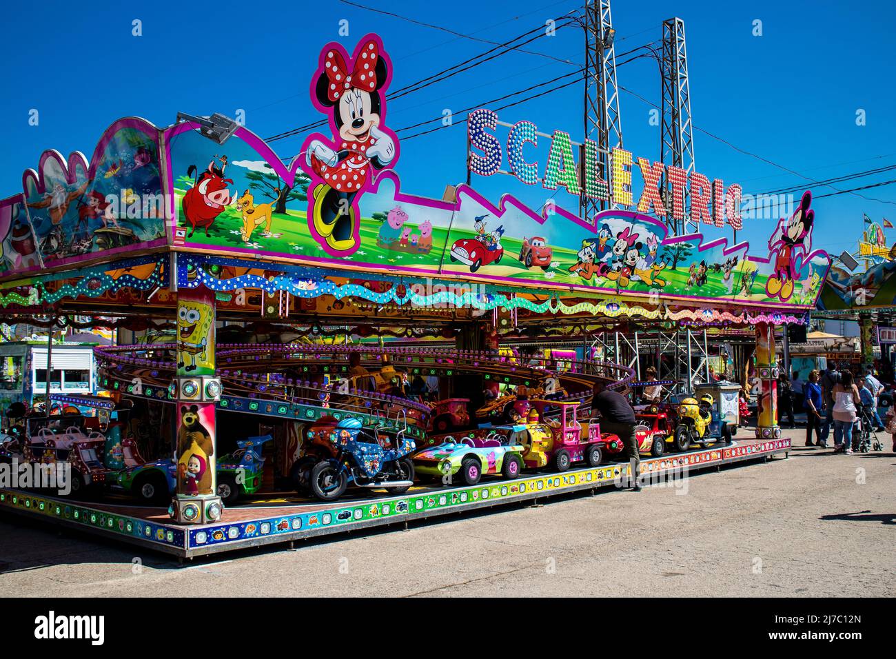Seville, Spain - May 05, 2022 Feria de Sevilla funfair, the attractions ...