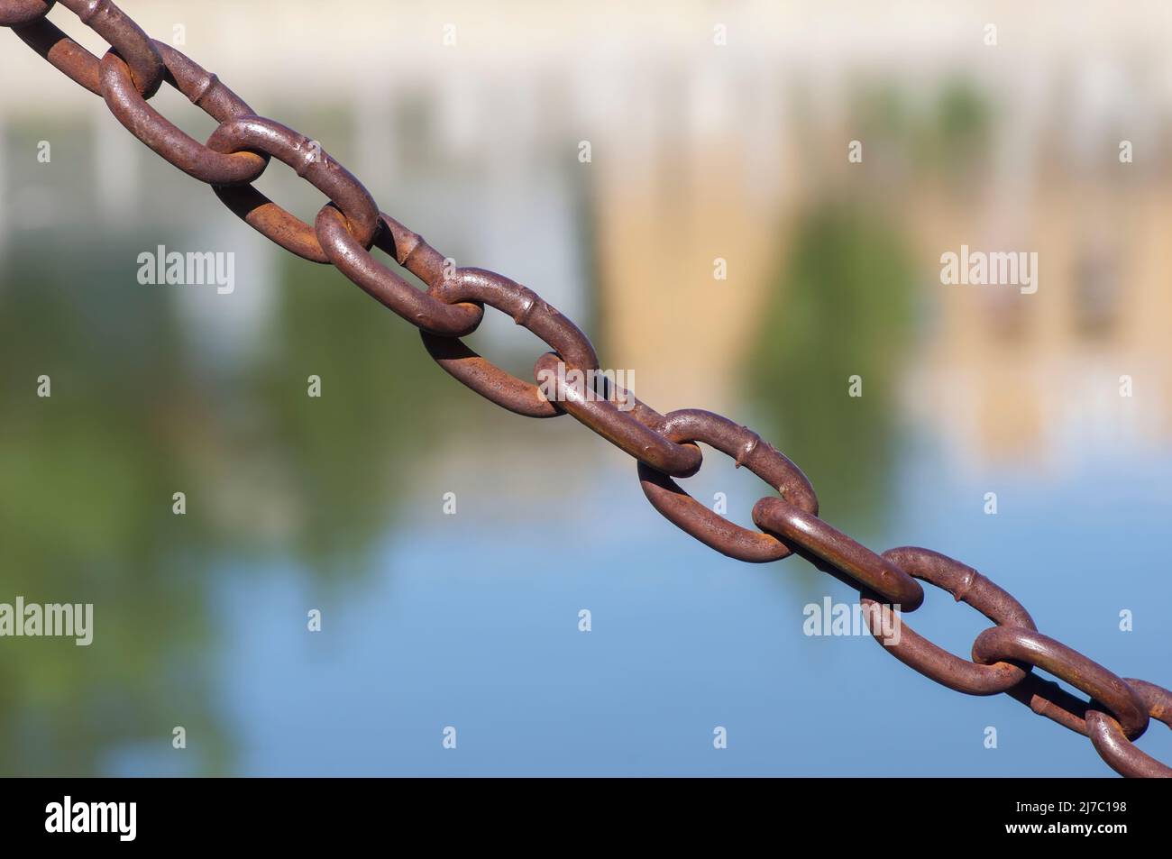 Rusty and dirty metal chain with blur background Stock Photo - Alamy