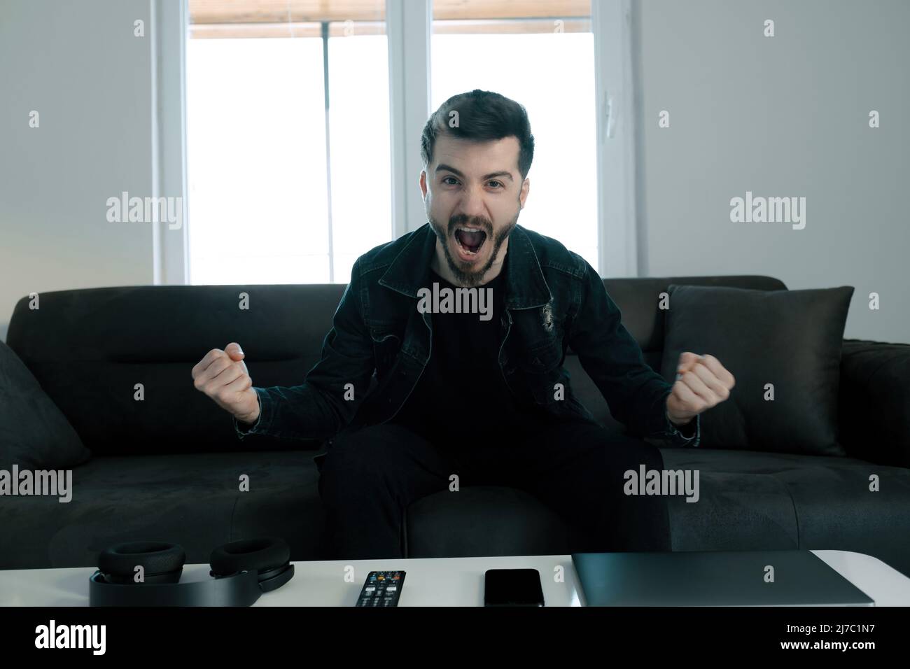 Frenzy, the young man who is very happy that his favorite team won the ...