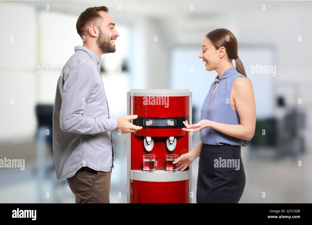 Happy workers water cooler hi-res stock photography and images - Alamy