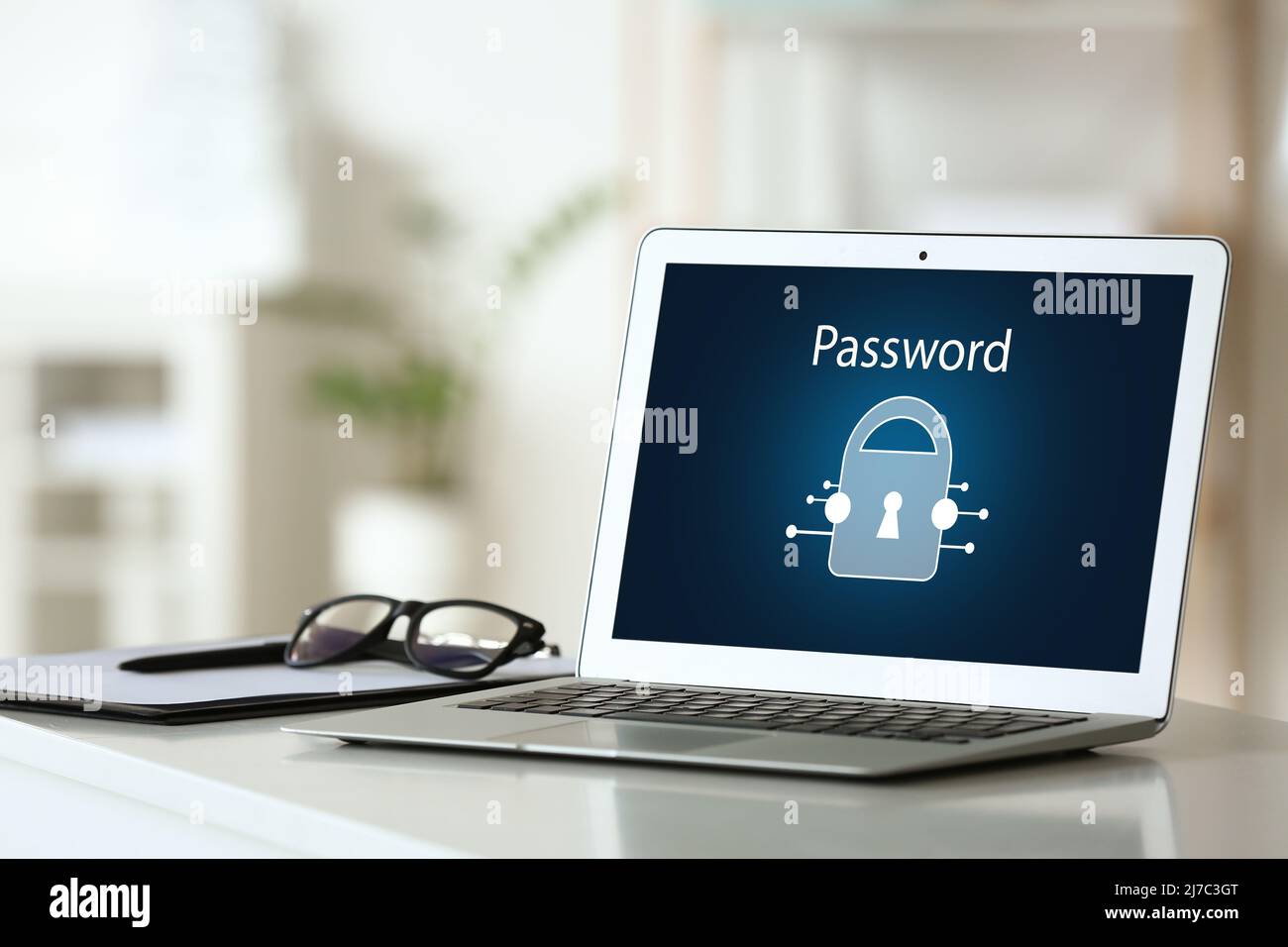 Laptop with word PASSWORD on locked screen in room Stock Photo - Alamy