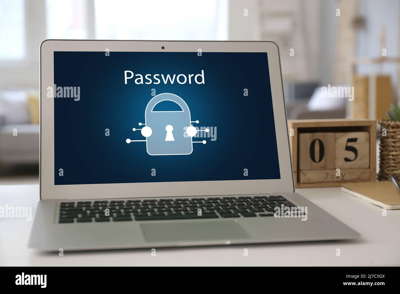 Laptop with word PASSWORD on locked screen in room Stock Photo - Alamy